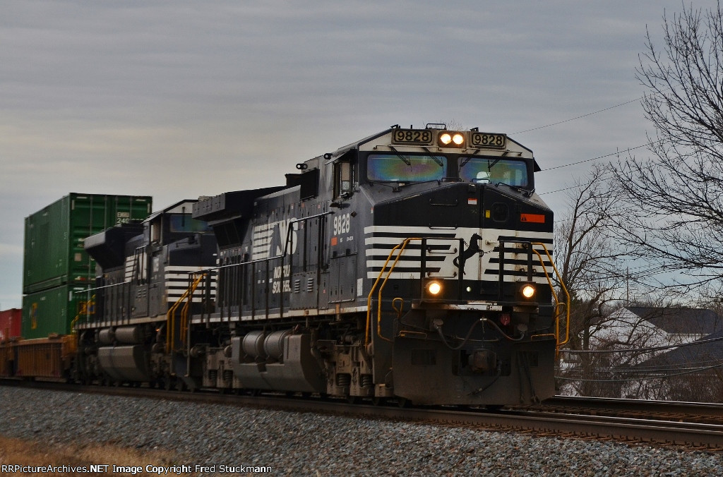 NS 9828 is eastbound.